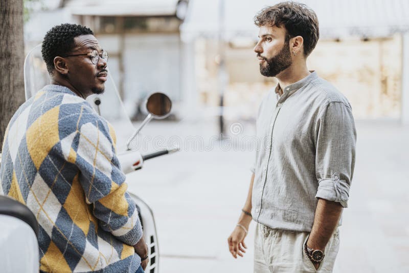 Multiracial Business Team Collaborating Outdoors during a Productive ...