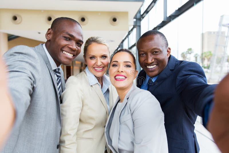 Happy Multi-ethnic Business Team with Thumbs Up Stock Photo - Image of ...