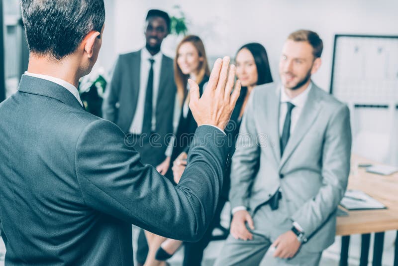 Multiracial Businesspeople Having Conversation Stock Photo - Image of ... Multiracial Businesspeople Having Conversation Stock Photo - Image of ...
