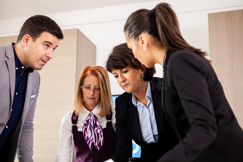 Multiracial Businesspeople Having Conversation in Conference Hall ... Multiracial Businesspeople Having Conversation in Conference Hall ...