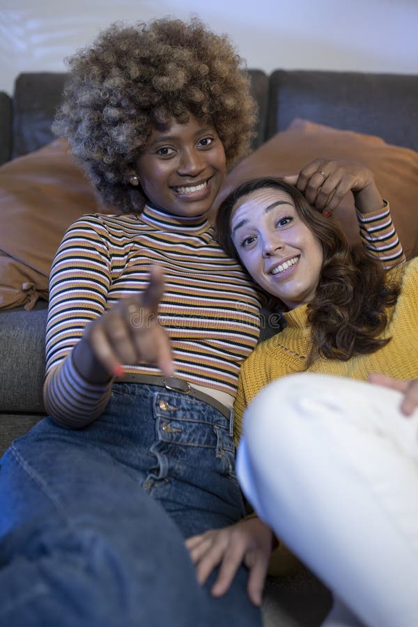 Cheerful Lesbian Couple Having Fun Together And Looking At Camera