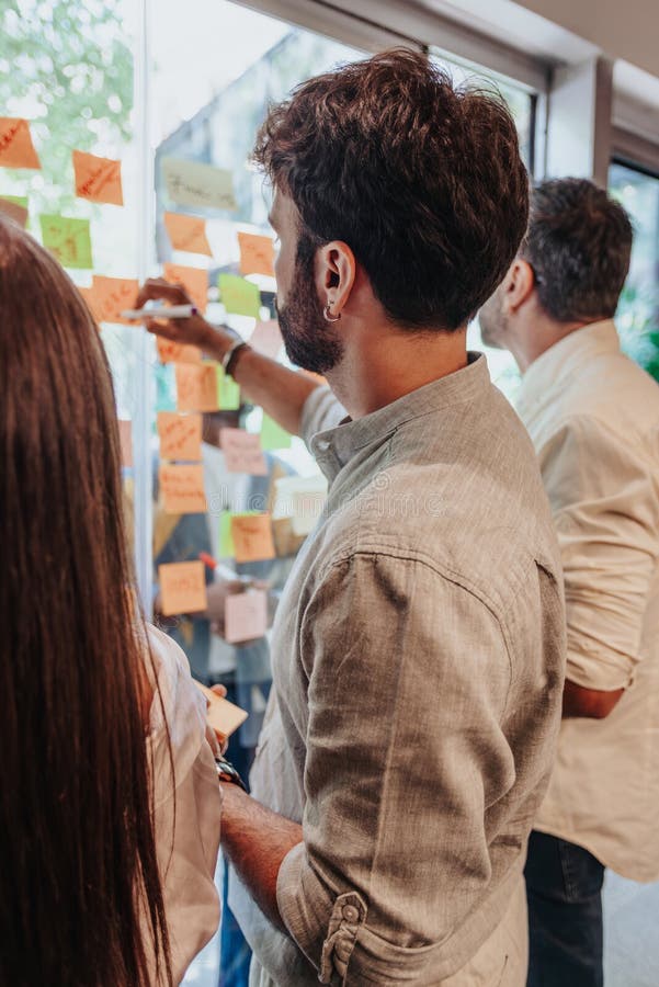 Multigenerational Business Team Brainstorming and Sharing Ideas in ...