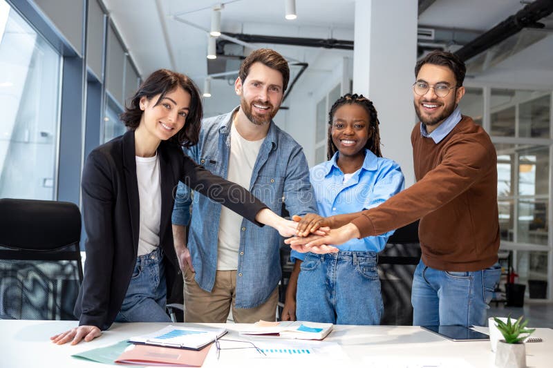 Multiracial Colleagues Involved in Team Building Activity Staff ...