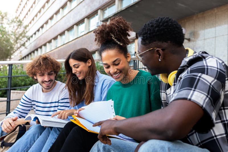 Multiracial College Students Study Together Sitting on Campus Steps ...