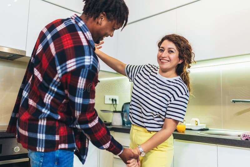 Happy Couple Dancing Salsa in the Kitchen Stock Photo - Image of curly ...