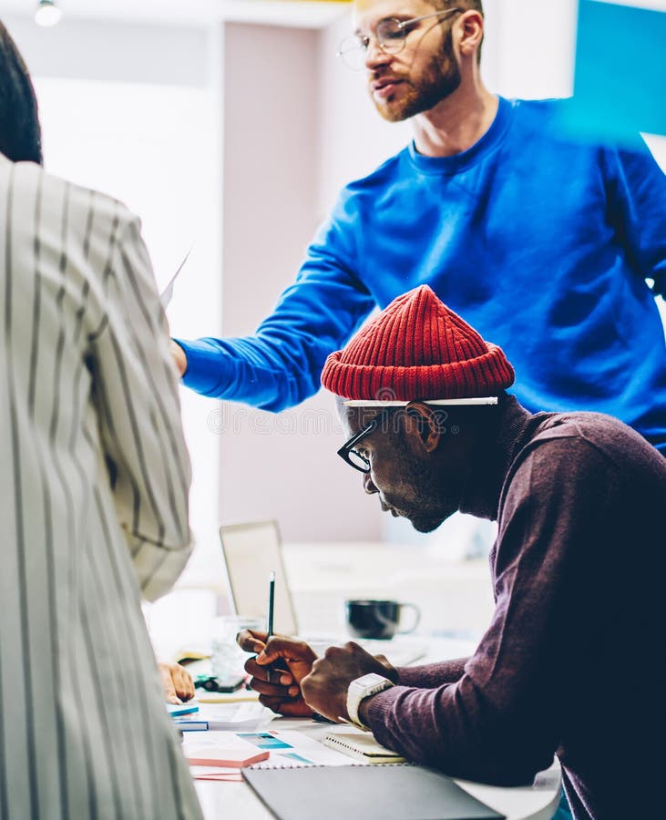 Multiracial Crew of Skilled Clever Students Cooperating on Project and ...