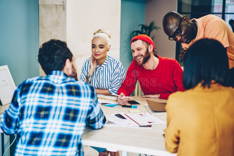 Multiracial Crew of Skilled Clever Students Cooperating on Project and ...