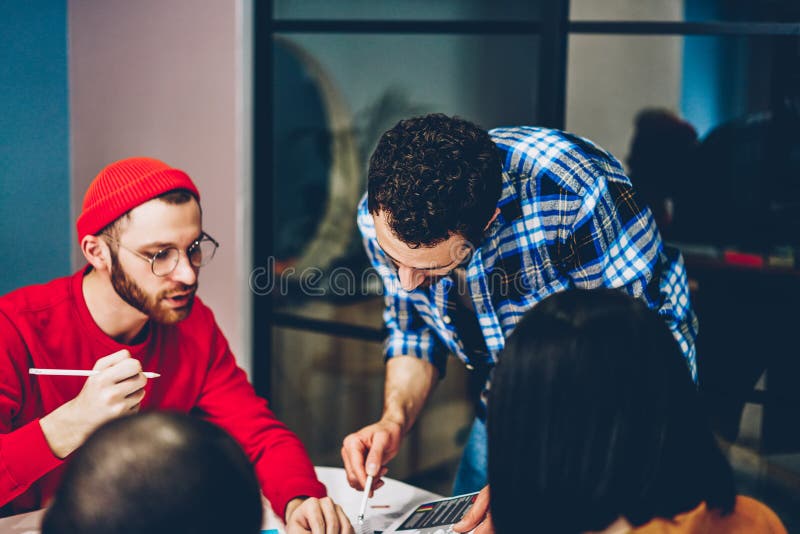 Multiracial Crew of Skilled Clever Students Cooperating on Project and ...