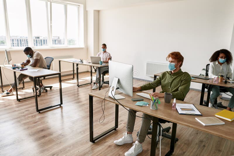 Multiracial Employees Work on Computers in Office Stock Image - Image ...