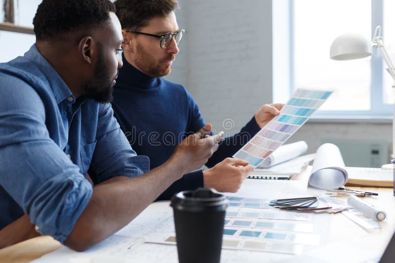 Multiracial Engineer Team Working in Office with Color Palette ...