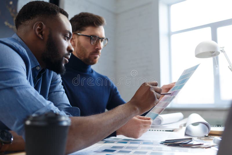 Multiracial Engineer Team Working in Office with Color Palette ...
