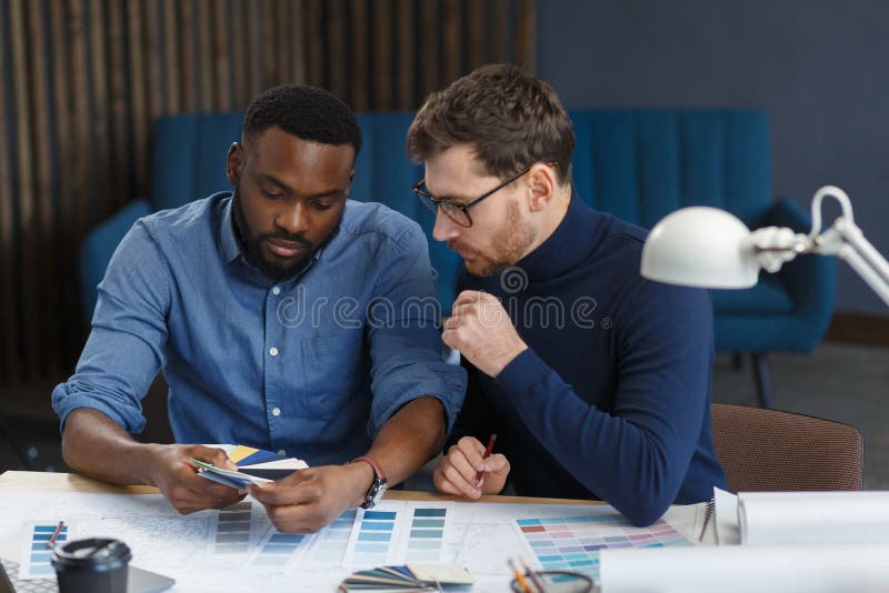 Multiracial Engineer Team Working in Office with Color Palette ...