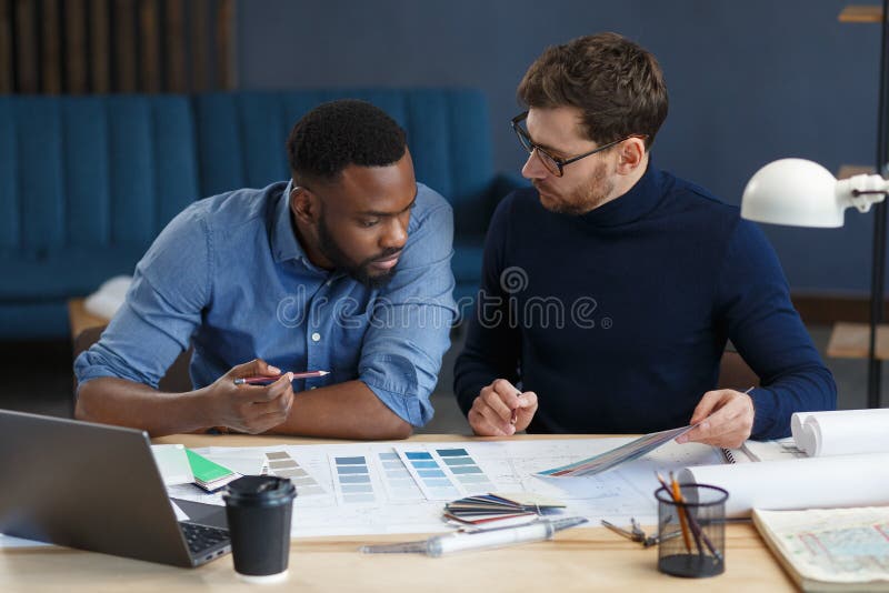 Multiracial Engineer Team Working in Office with Color Palette ...