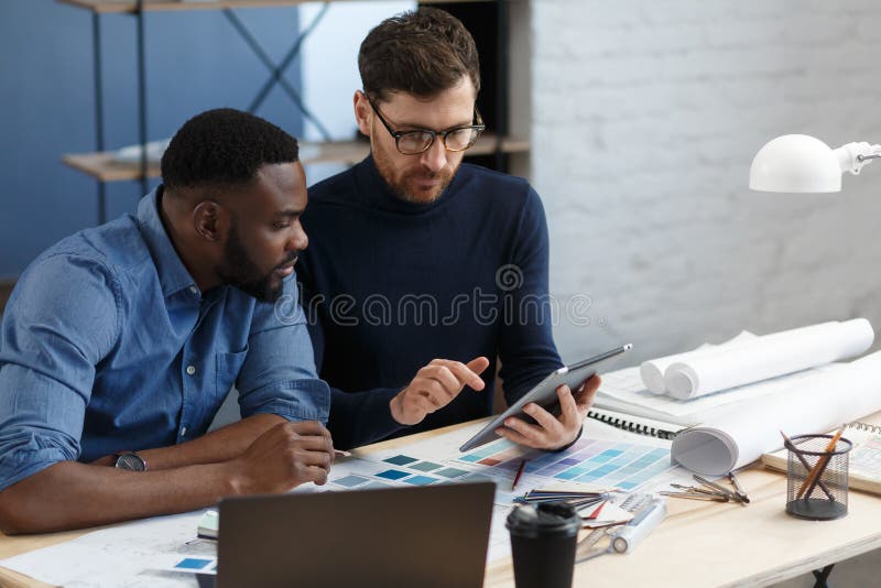 Multiracial Engineer Team Working in Office with Color Palette ...