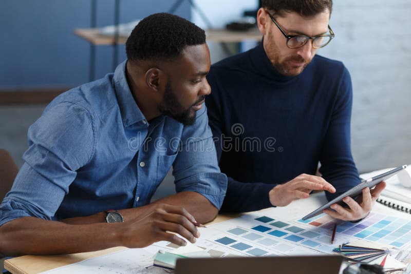 Multiracial Engineer Team Working in Office with Color Palette ...