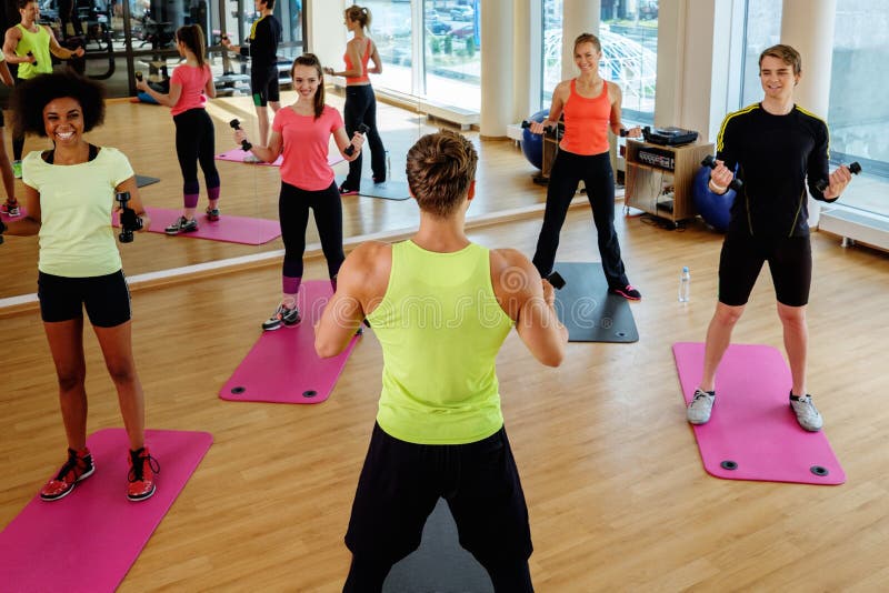 Multiracial Group Doing Aerobics Exercise Stock Photo - Image of team ...