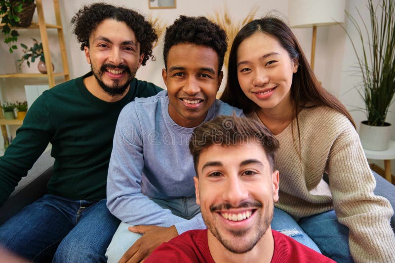 Multiracial Group of Friends Taking a Selfie at Home. Stock Image ...