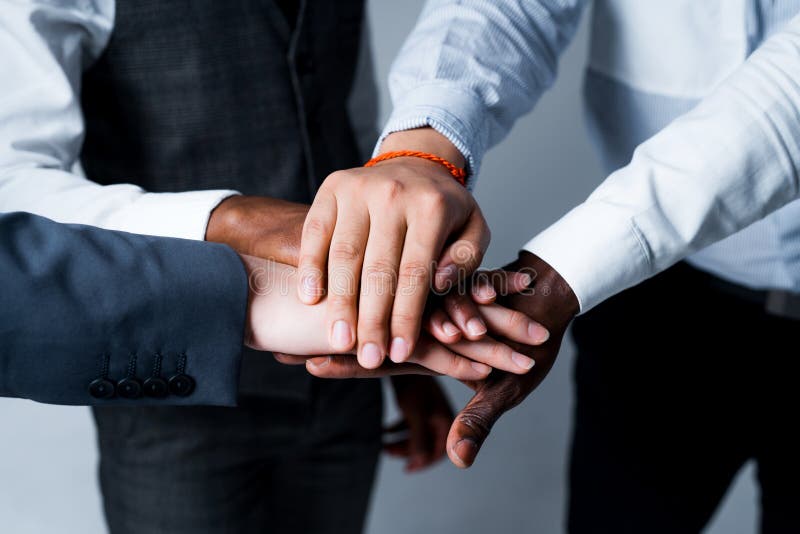 Multiracial Group of People Fold Their Hands on Top of Each Other ...