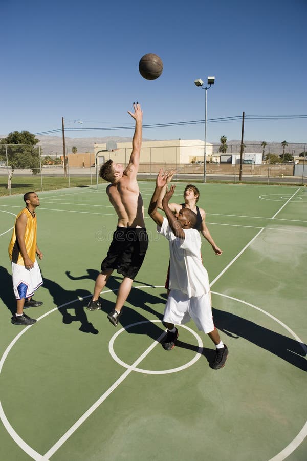 Multiracial Group Playing Basket Ball Stock Photo - Image of american ...