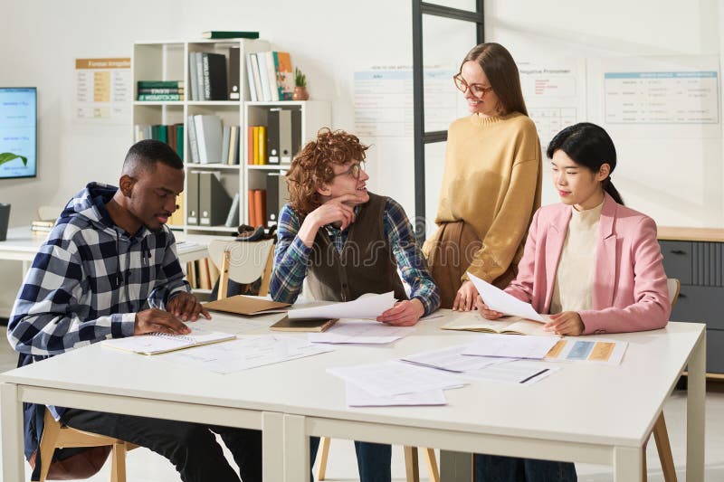 Diverse Group of Students Studying in Classroom Stock Photo - Image of ...