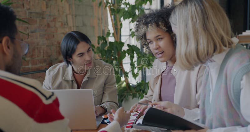 Multiracial Group of Young People Designers Working Together in ...