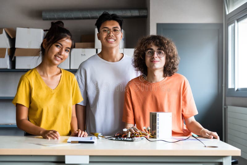 Multiracial High School Students in Electronics Class Looking at Camera ...