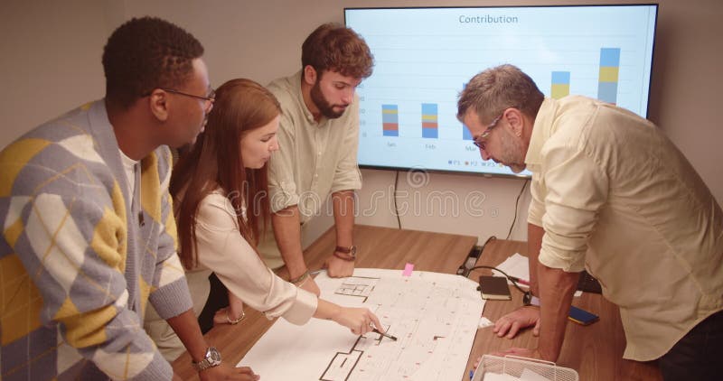 Multiracial, Inter Generational Business Team Collaborating on ...