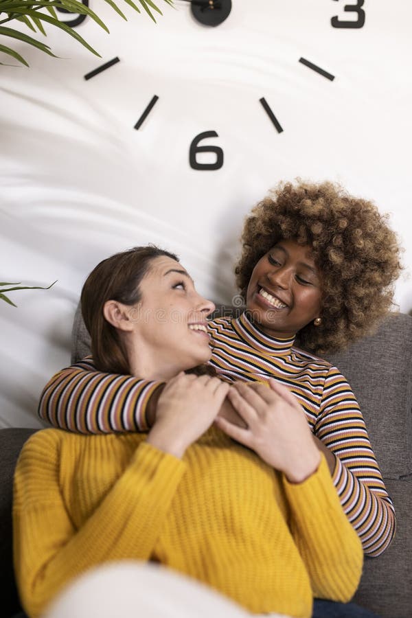 Cheerful Lesbian Couple Having Fun Together And Looking At Camera