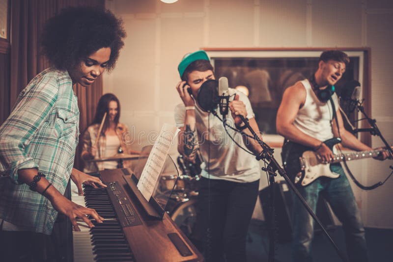 Music Band in a Cd Recording Studio Stock Photo - Image of band, rock ...
