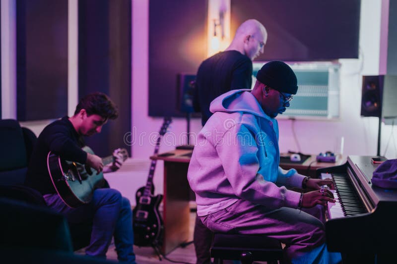 Multiracial Musicians Collaborating Modern Music Studio Instruments ...
