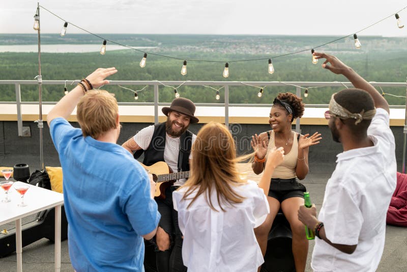 Multiracial People Having Fun at Rooftop Party Stock Image - Image of ...