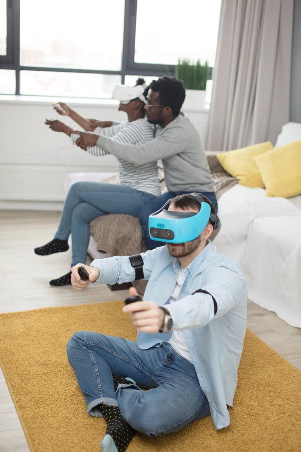 Multiracial Group of Friends Having Fun Trying on 3D Virtual Reality ...