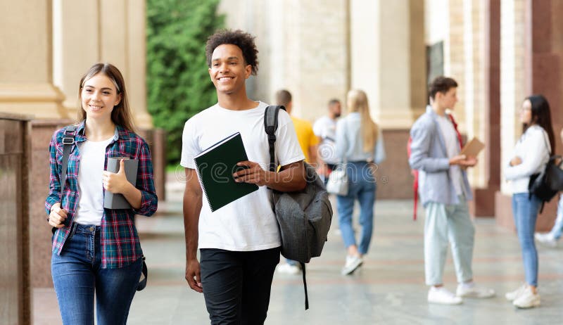 Multiracial Students Walking in University Hall Outdoors Stock Photo ...