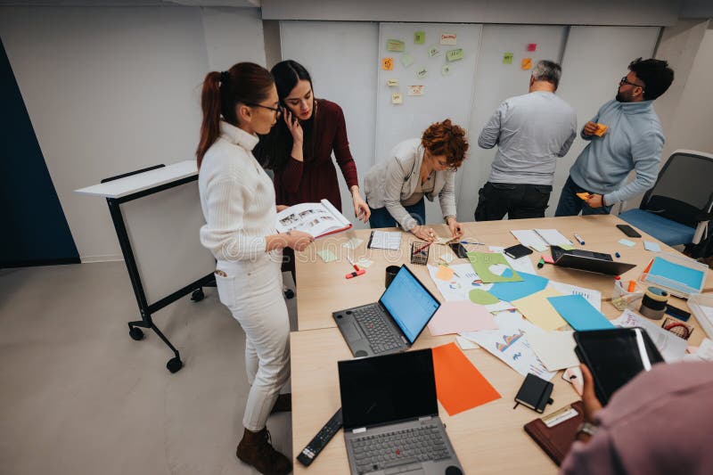 Multiracial Team Engaged in Business Analytics Workshop. Stock Photo ...