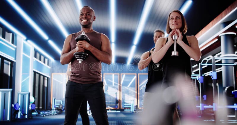 Multiracial Training Team Squats Together Stock Photo - Image of ...