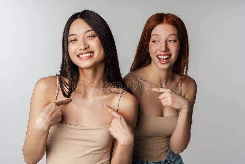 Multiracial Two Women Laughing and Pointing Finger at Themselves Stock ... Multiracial Two Women Laughing and Pointing Finger at Themselves Stock ...