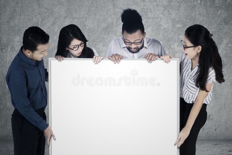 Multiracial Workers Looking at Empty Whiteboard Stock Image - Image of ...