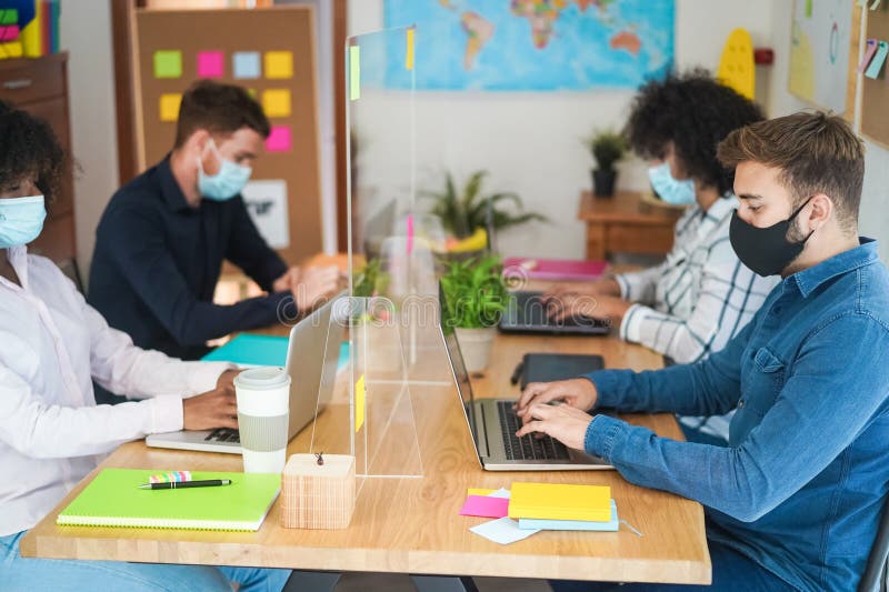 Multiracial Young Creative People Working Inside Modern Office while ...
