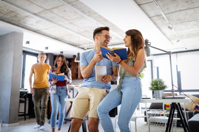 Multiracial Young People Enjoying Group Study at Table. Stock Image ...