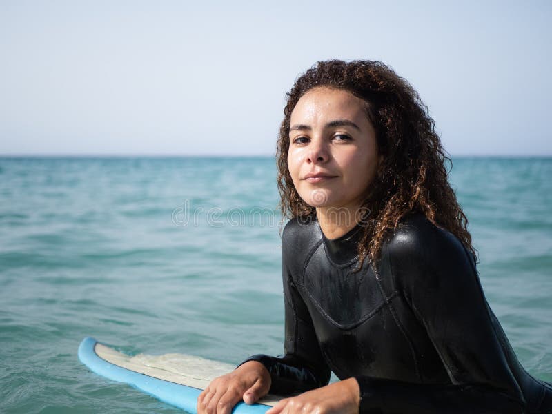 Multiracial Young Surfer Female Portrait in the Water Stock Image ...