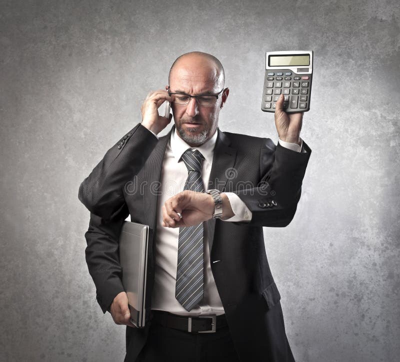 Businessman multitasking stock photo. Image of leader - 25640436