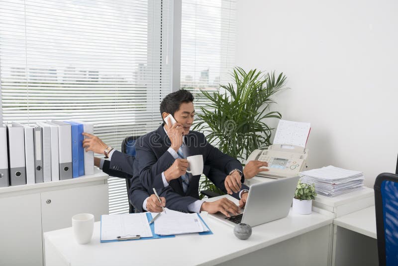 Multitasking businessman stock image. Image of document - 59203895