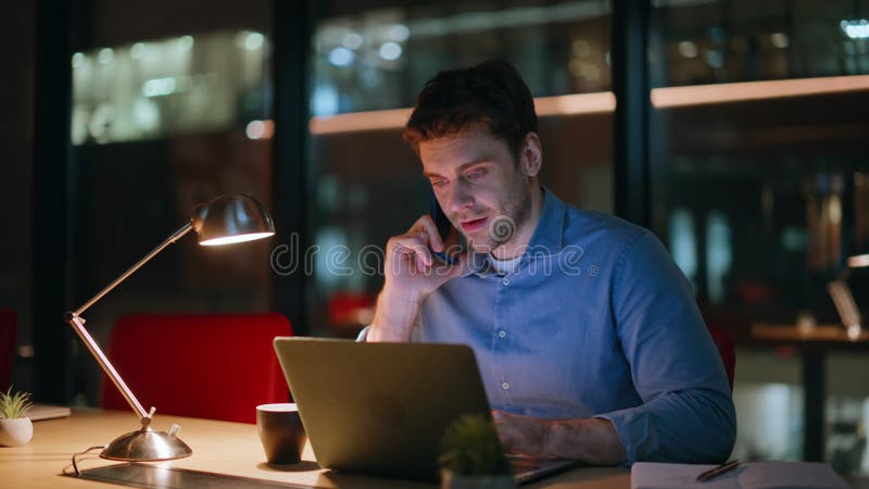 Multitasking Ceo Talking Cellphone Looking Laptop Screen at Night ...