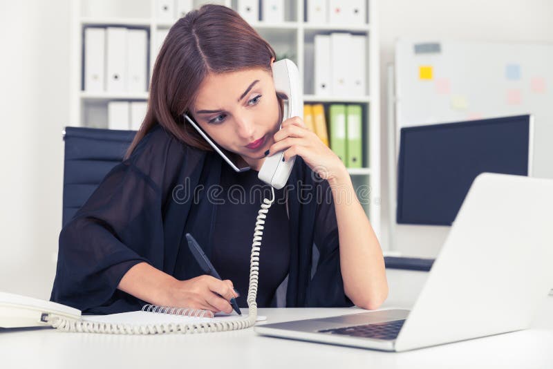 Multitasking girl in black stock image. Image of attendance - 77782147