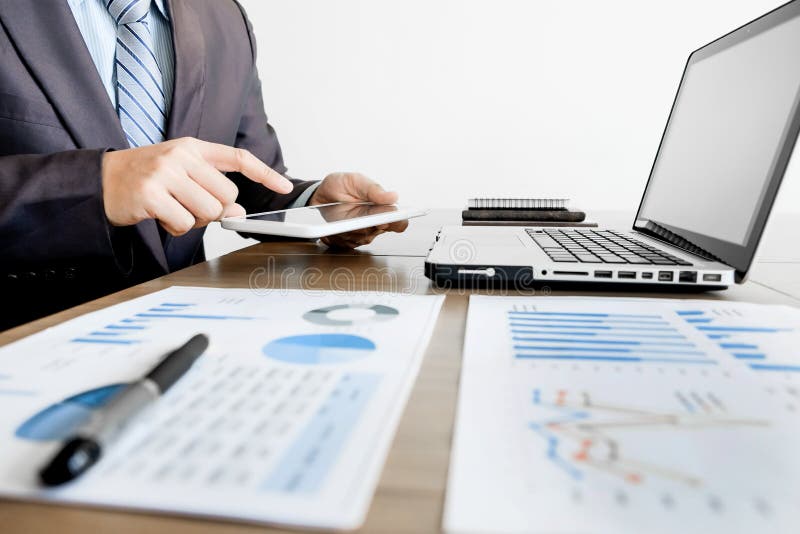 Multitasking Handsome Young Man Working Touchpad Sit Stock Photos ... Multitasking Handsome Young Man Working Touchpad Sit Stock Photos ...