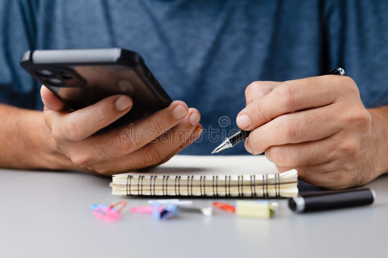 Multitasking with Smartphone and Notebook Stock Photo - Image of device ...