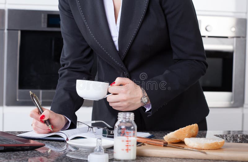 Multitasking Woman - Cooking Meal And Working Stock Image - Image of ...
