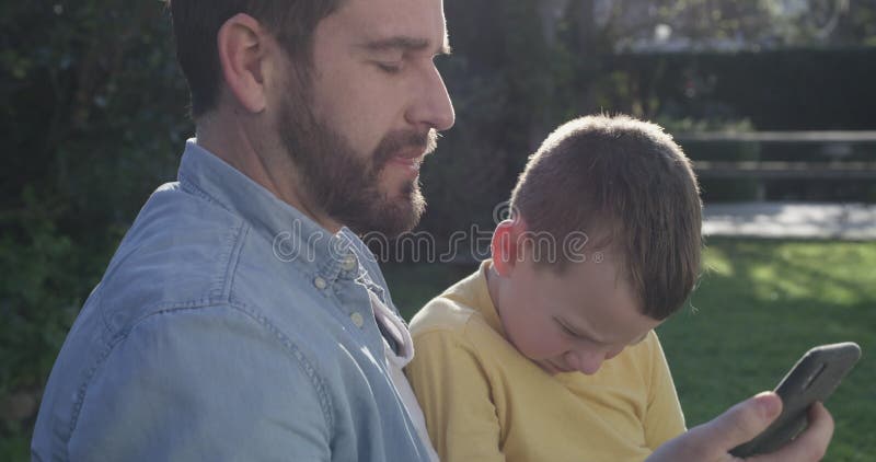 Multitasking, Work and Dad with Phone Call and Child on Tablet in ...