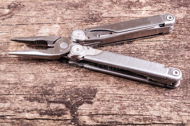 Multitool, Multi Purpose Tool with Plyers Stock Photo - Image of ...