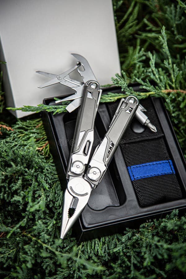 Multitool Pocket Knife in Open Case on Greenery Stock Photo - Image of ...